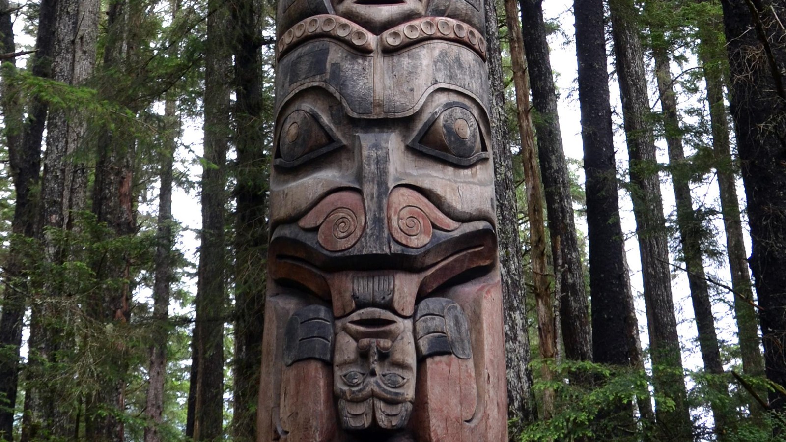 Mosquito Legend Pole (U.S. National Park Service)